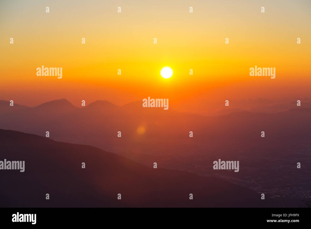 Mountains on sunset Stock Photo - Alamy