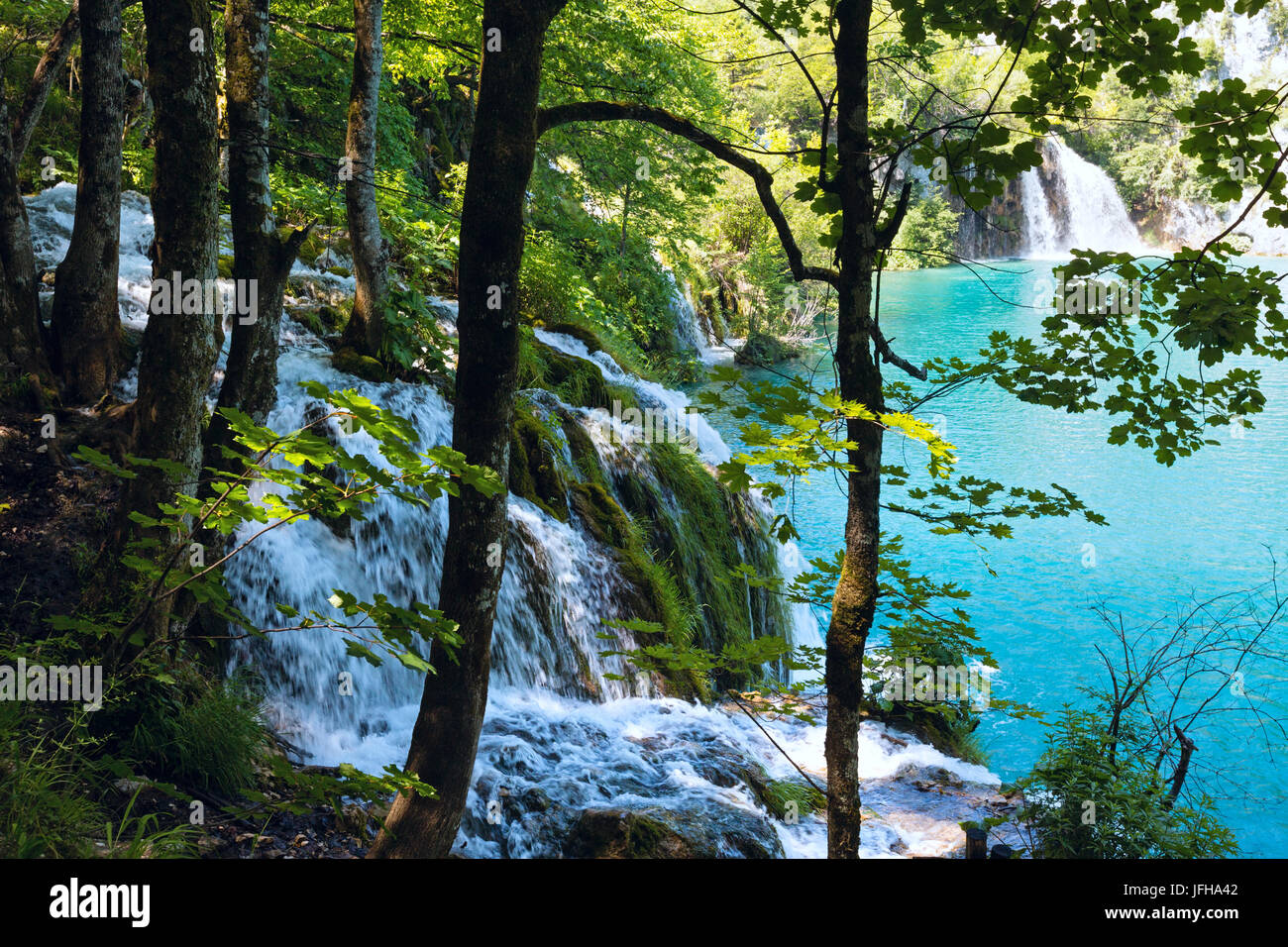 Waterfalls and azure lake in Plitvice Lakes National Park (Croatia ...