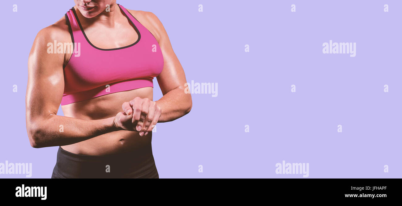 Muscular woman flexing arm hi-res stock photography and images - Alamy