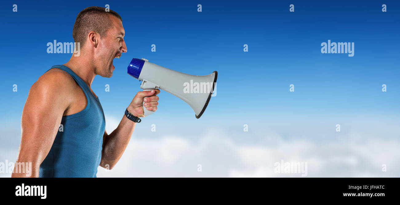 Composite image of angry male trainer yelling through megaphone Stock ...