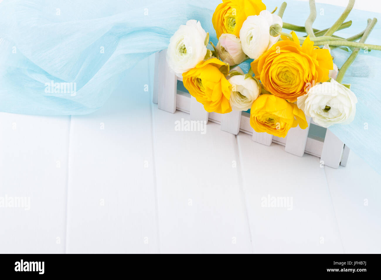 Bouquet of yellow and white ranunculus Stock Photo - Alamy