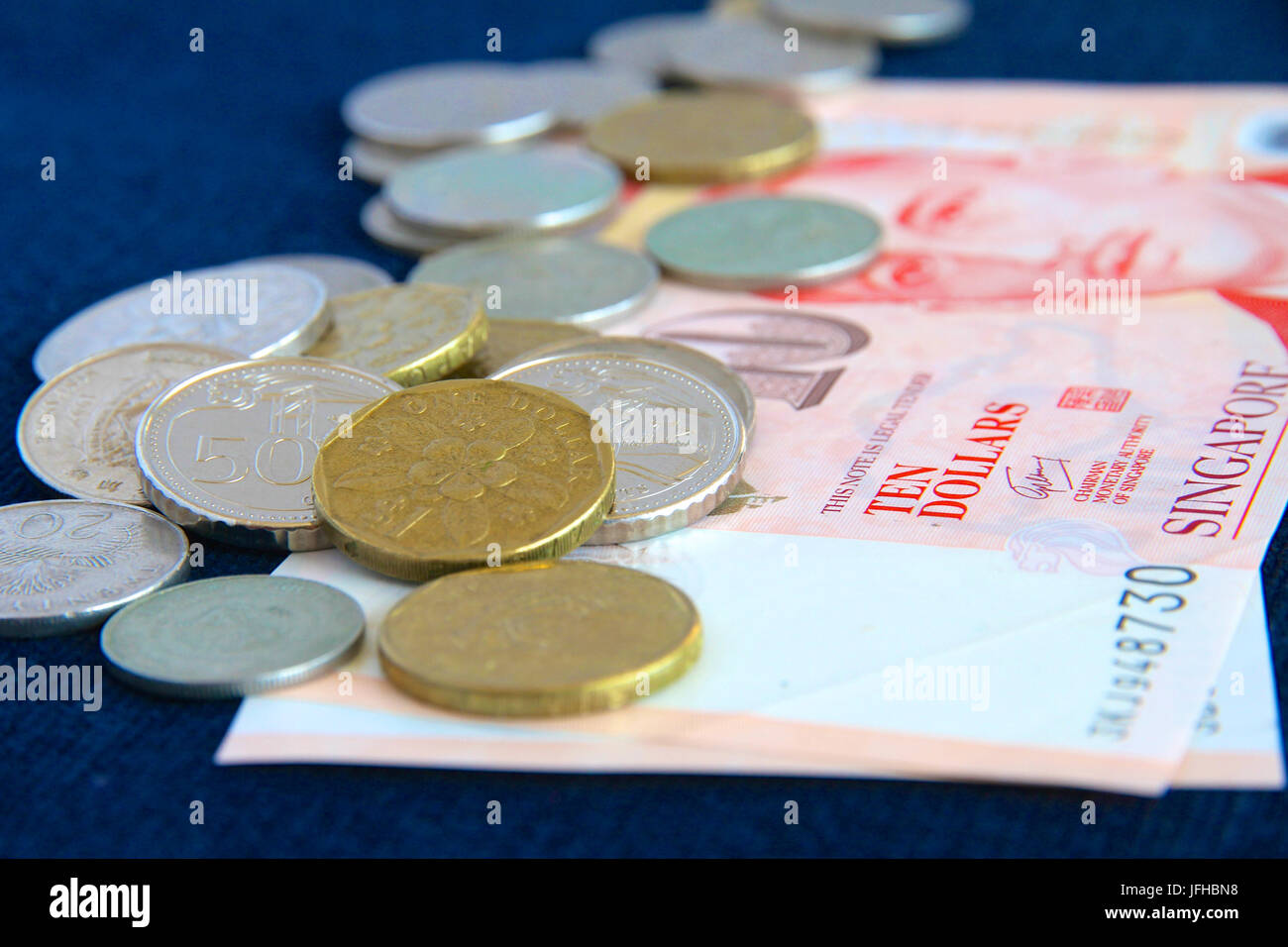 Singaporean notes and coins Stock Photo - Alamy