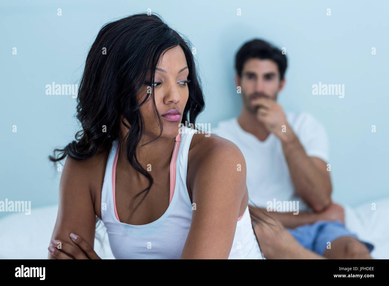 Couple ignoring each other bed hi-res stock photography and images - Alamy