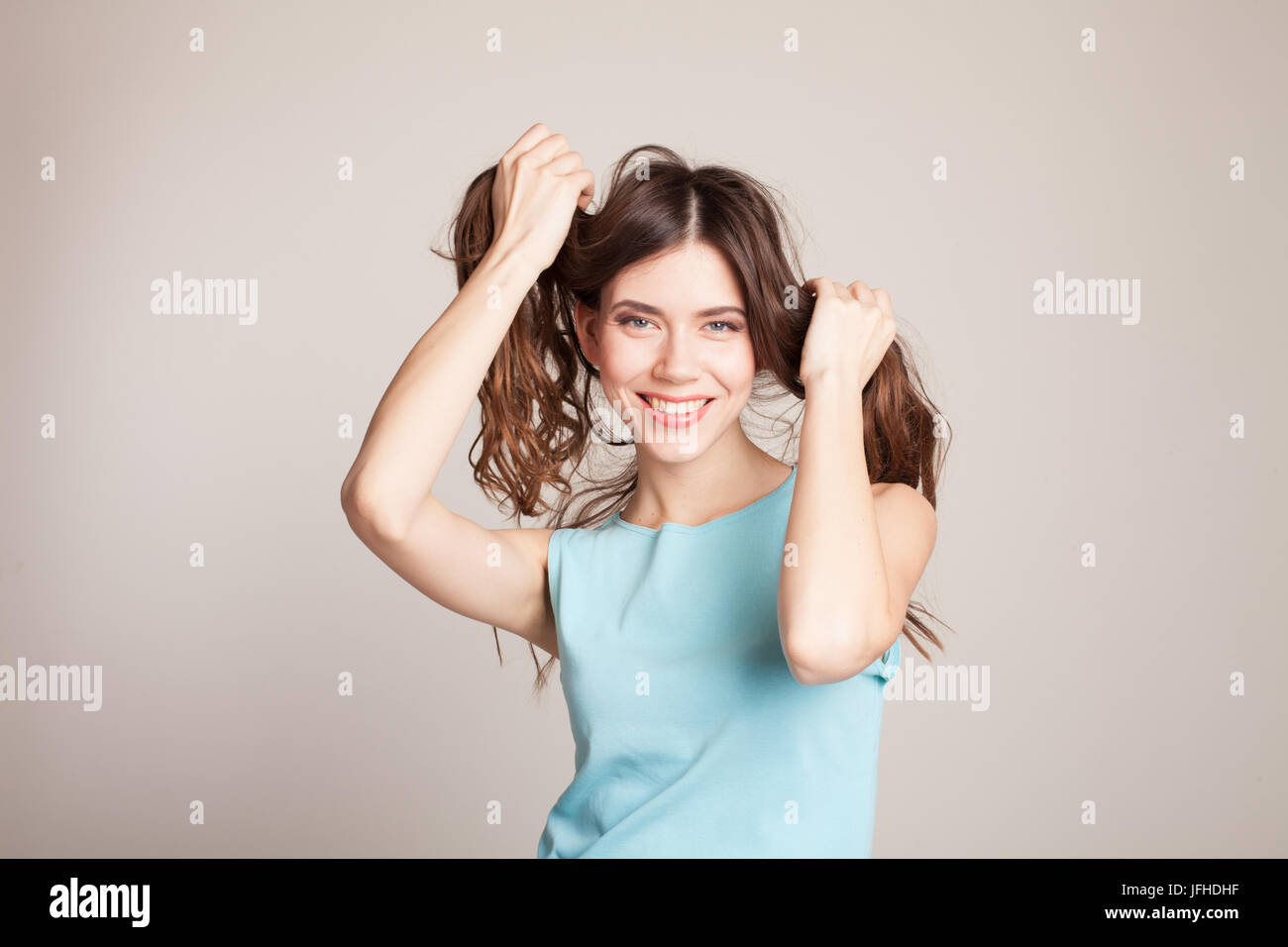 beautiful girl holding hands, their hair Stock Photo - Alamy