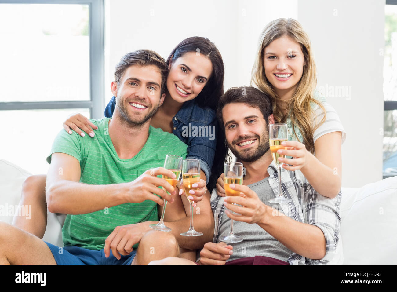 Woman drinking alcohol on sofa hi-res stock photography and images - Alamy