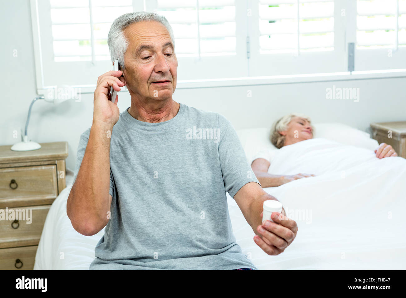 Elderly man woman talking house hi-res stock photography and images - Alamy