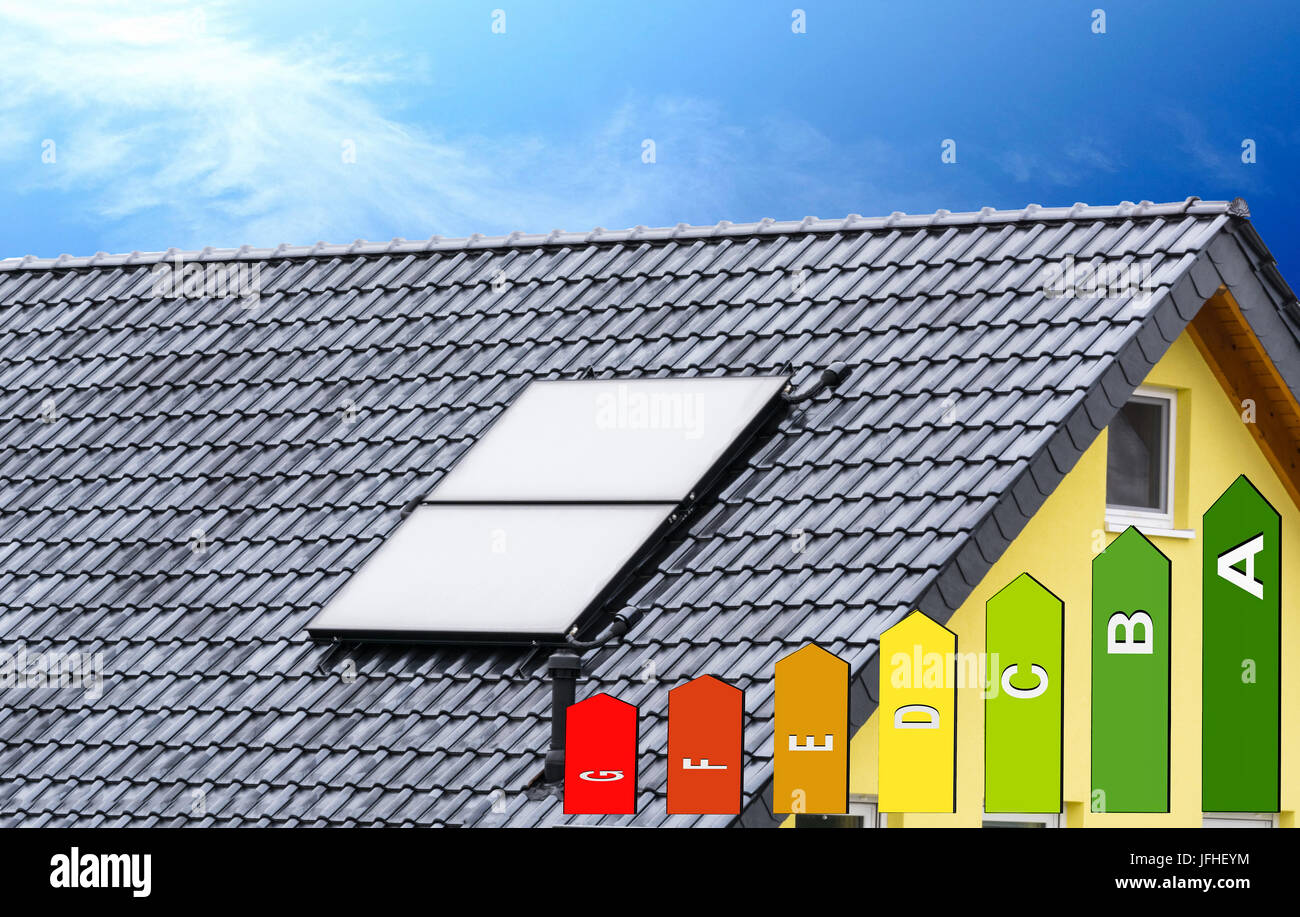 Solar panels on the roof and energy labeling Stock Photo - Alamy