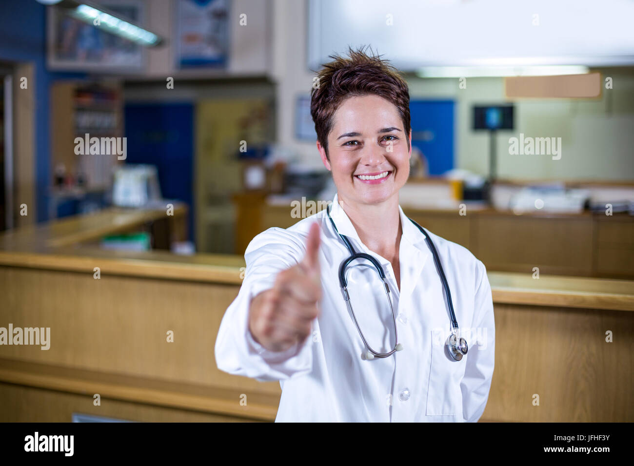 Young positive veterinarian smiling hi-res stock photography and images ...