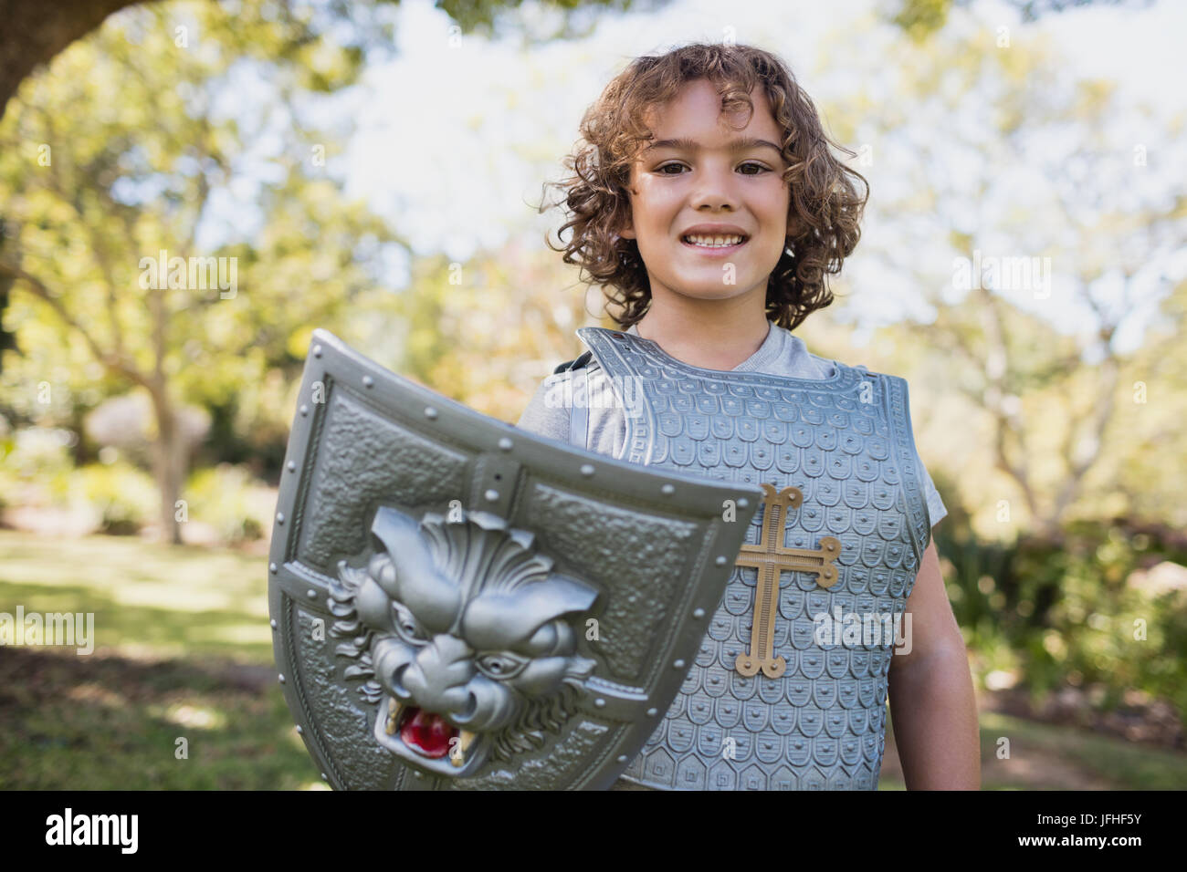 Portrait of a cute boy pretending to be a knight Stock Photo - Alamy