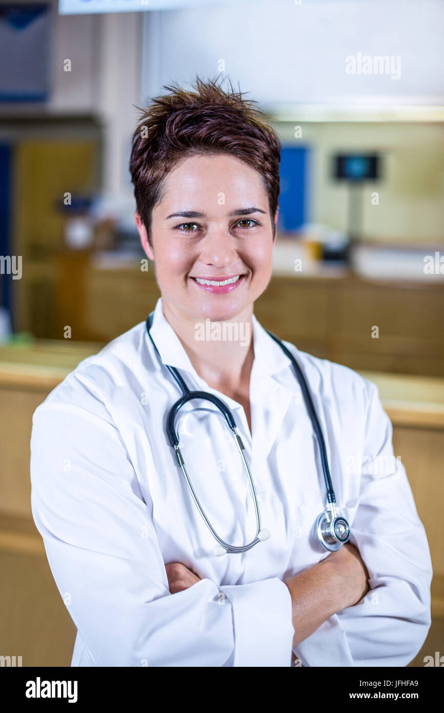 Portrait of woman vet smiling and crossed arms Stock Photo - Alamy