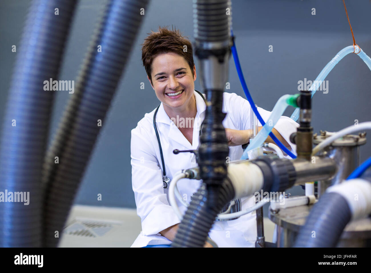 Woman vet posing smiling hi-res stock photography and images - Alamy