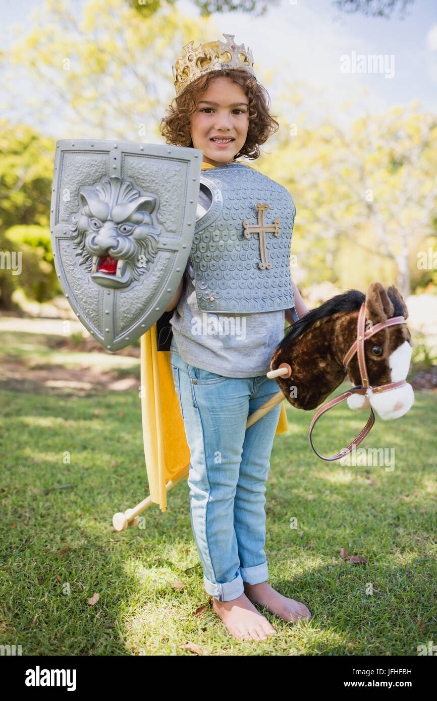 Portrait of a cute boy pretending to be a knight Stock Photo - Alamy