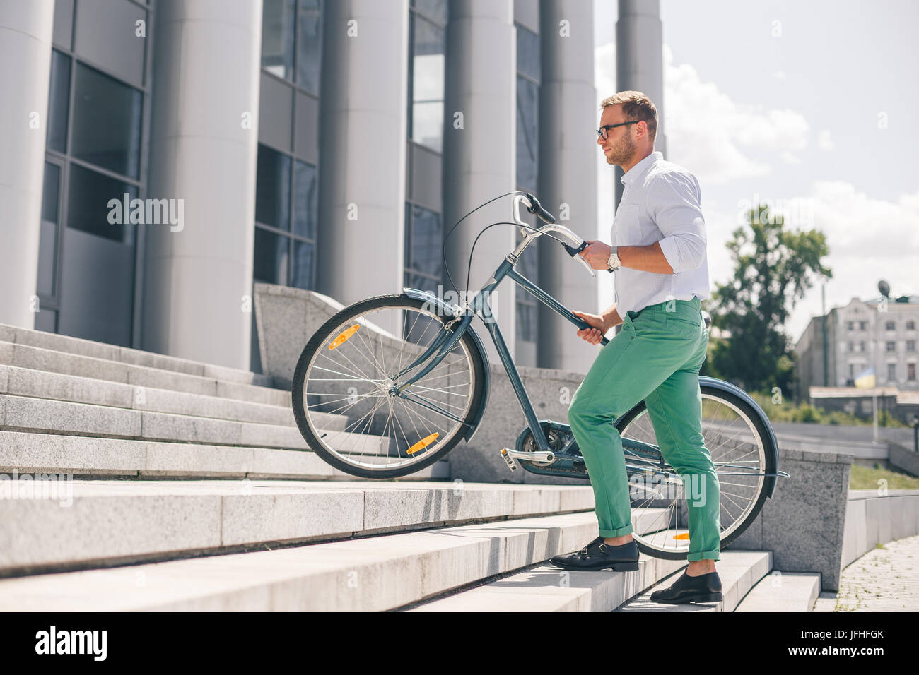 Cycling up steps hi-res stock photography and images - Alamy