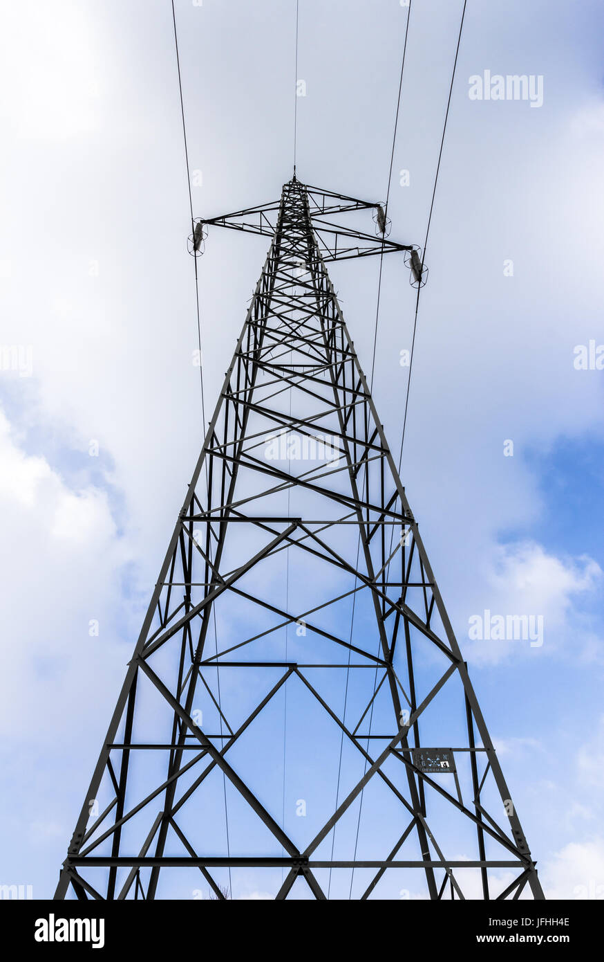 Bottom view of a electricity tower Stock Photo - Alamy