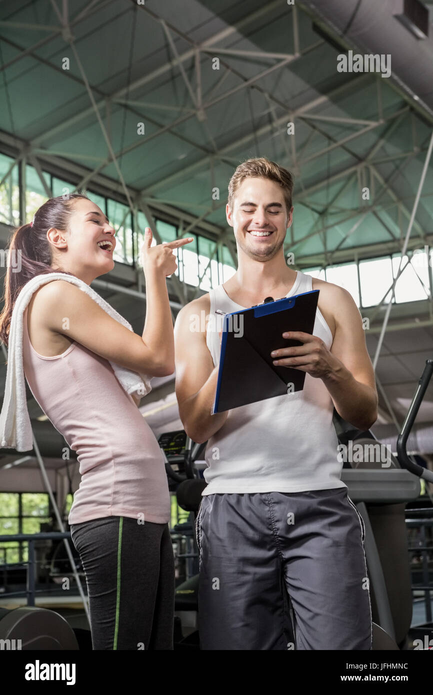 Woman and personal trainer talking hi-res stock photography and images ...