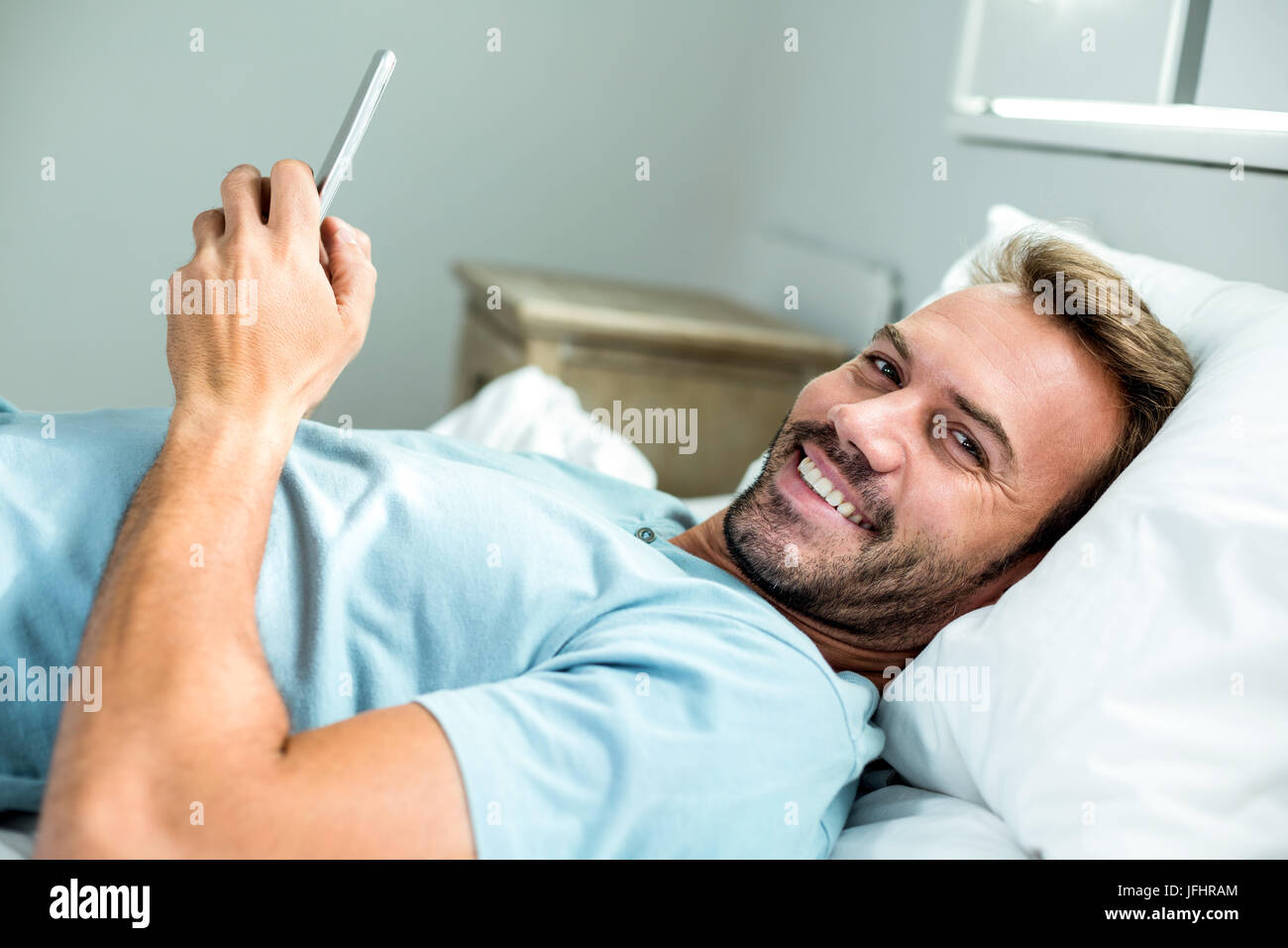 Handsome man lying down on his back hi-res stock photography and images ...