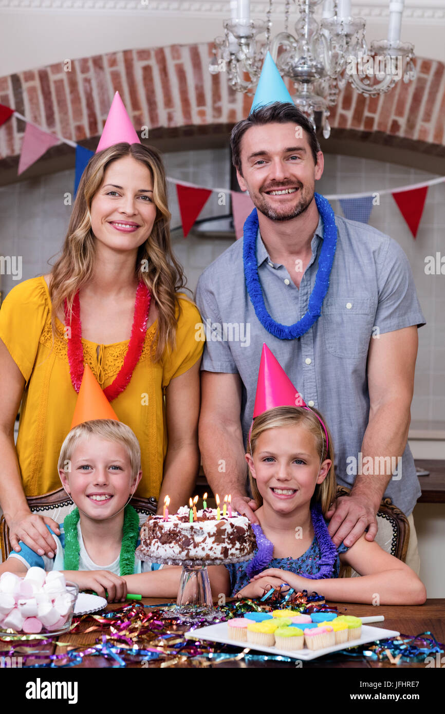 Portrait of family having fun at birthday party Stock Photo - Alamy