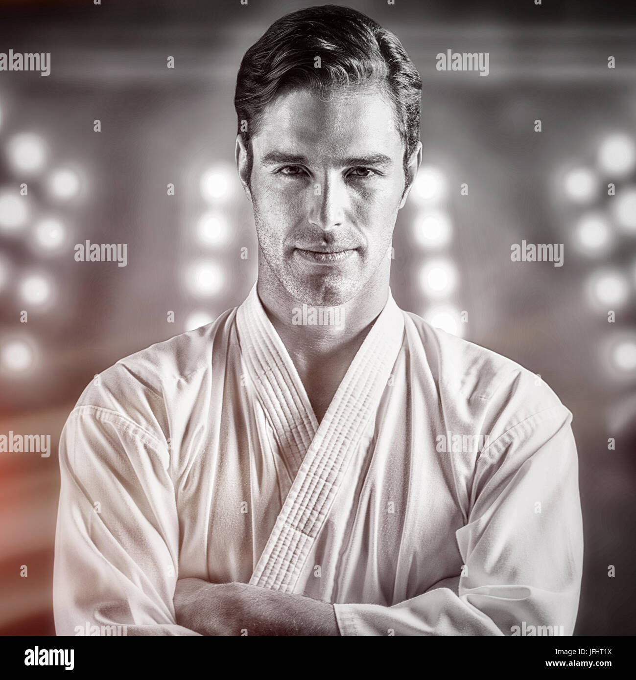 Composite image of portrait of fighter standing on black background ...