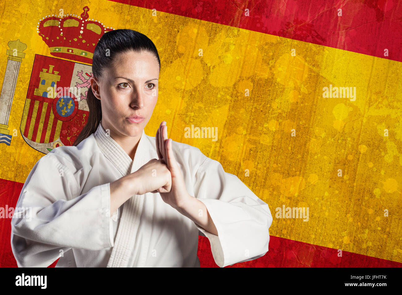 Composite image of female fighter performing hand salute Stock Photo ...