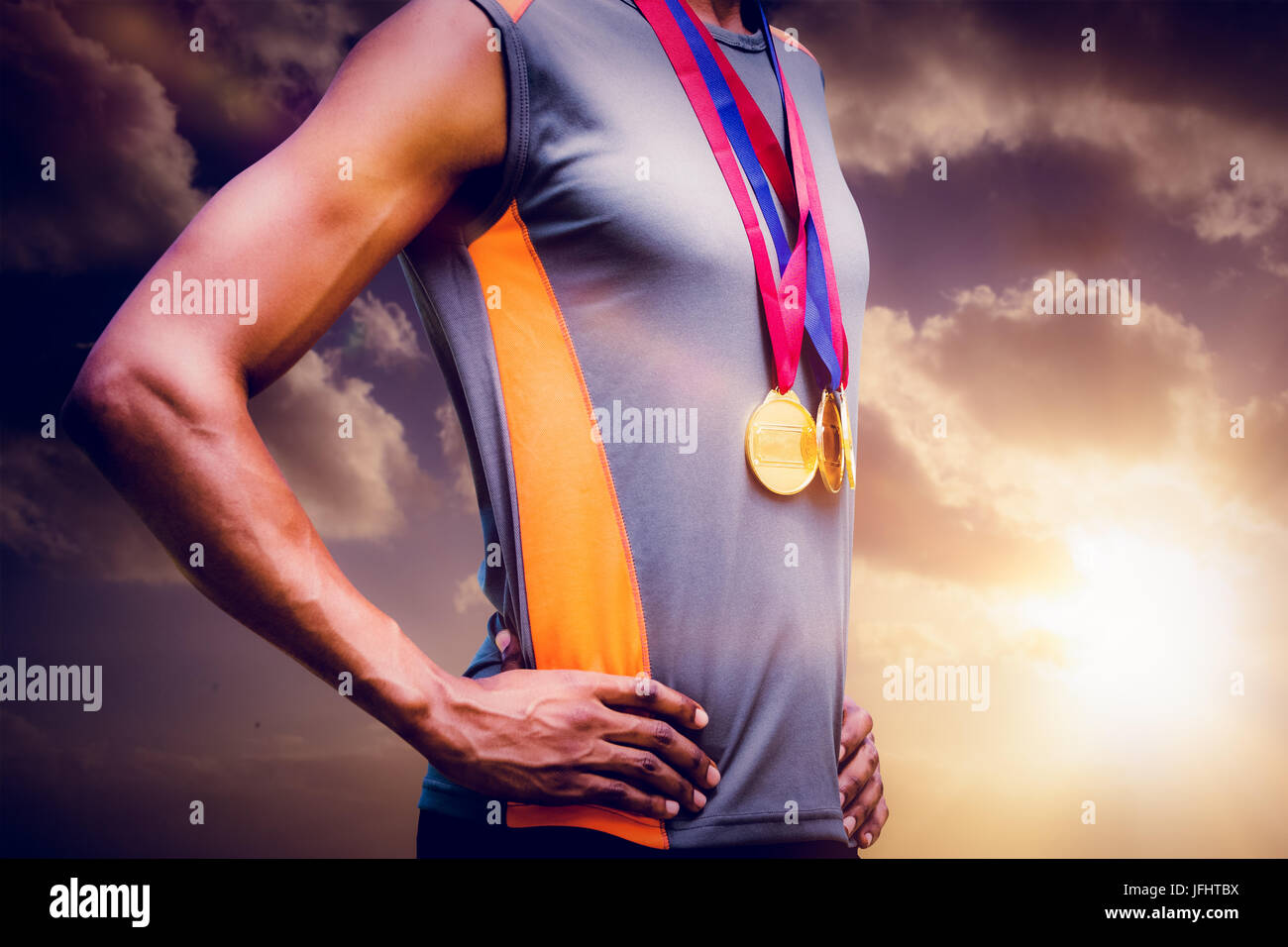 Composite image of portrait of sportsman chest with medals Stock Photo ...