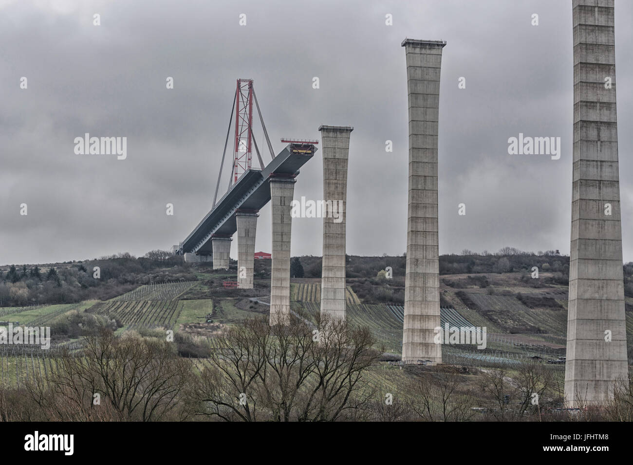 Bridge construction site under a dramatic sky Stock Photo - Alamy