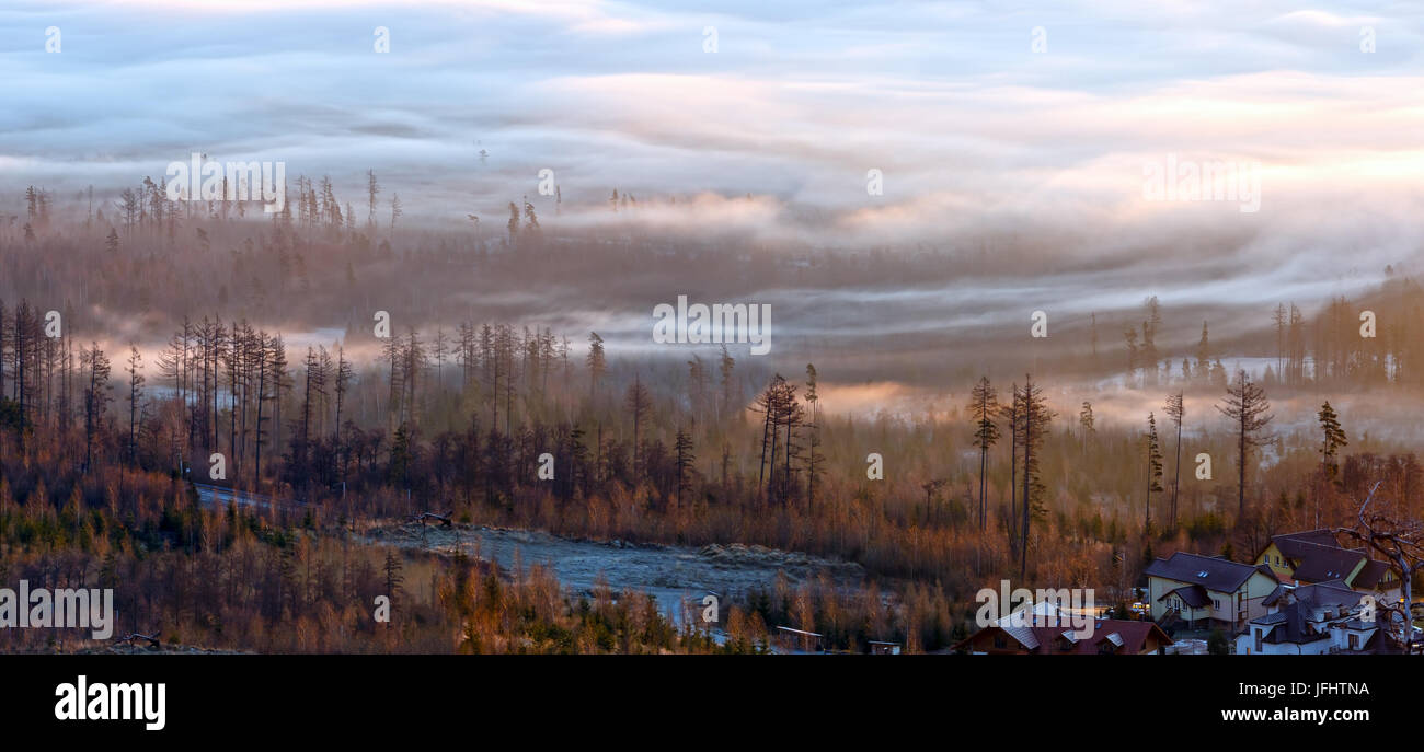 Clouds illuminated by morning sun over valley Stock Photo - Alamy