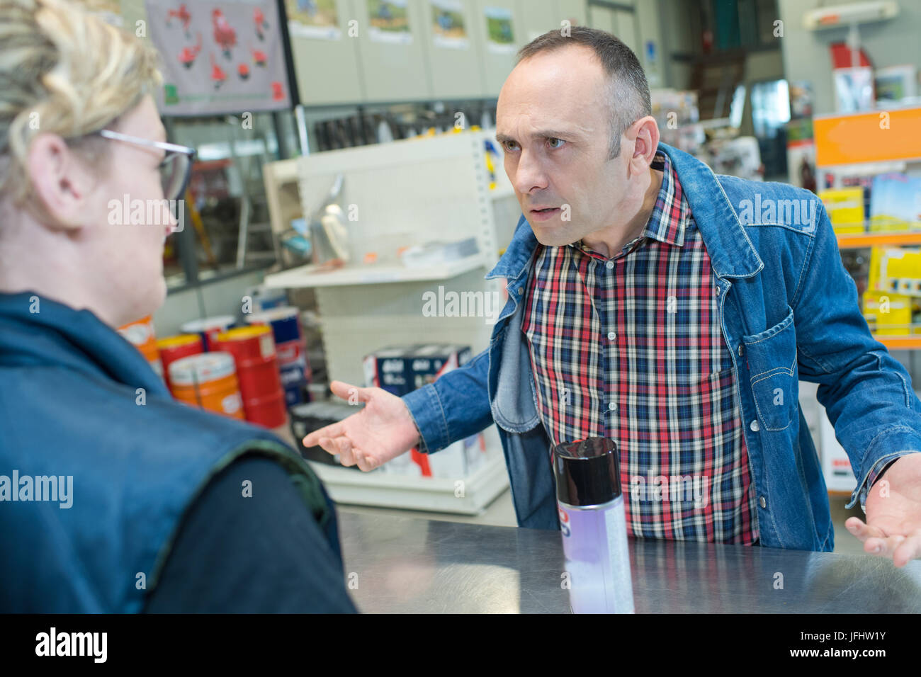 Shop counter angry hi-res stock photography and images - Alamy