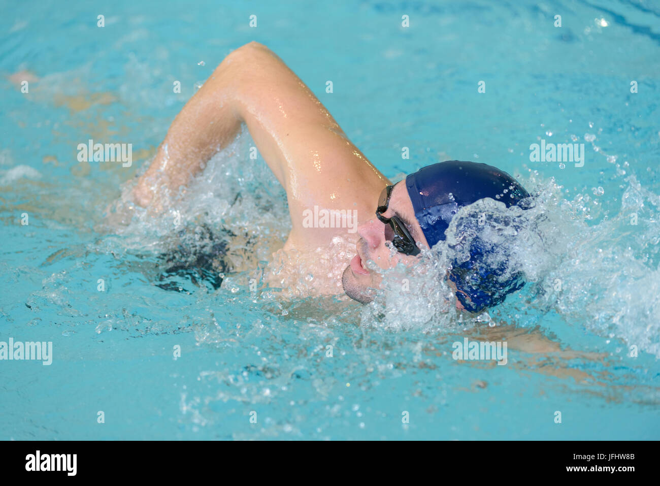 Male swimmer doing front crawl Stock Photo - Alamy
