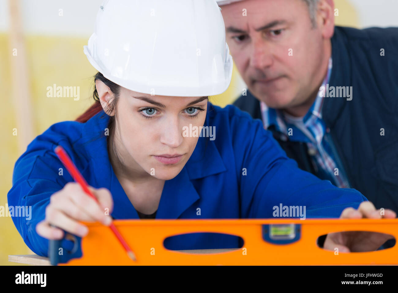 Construction site manager overseeing hi-res stock photography and ...