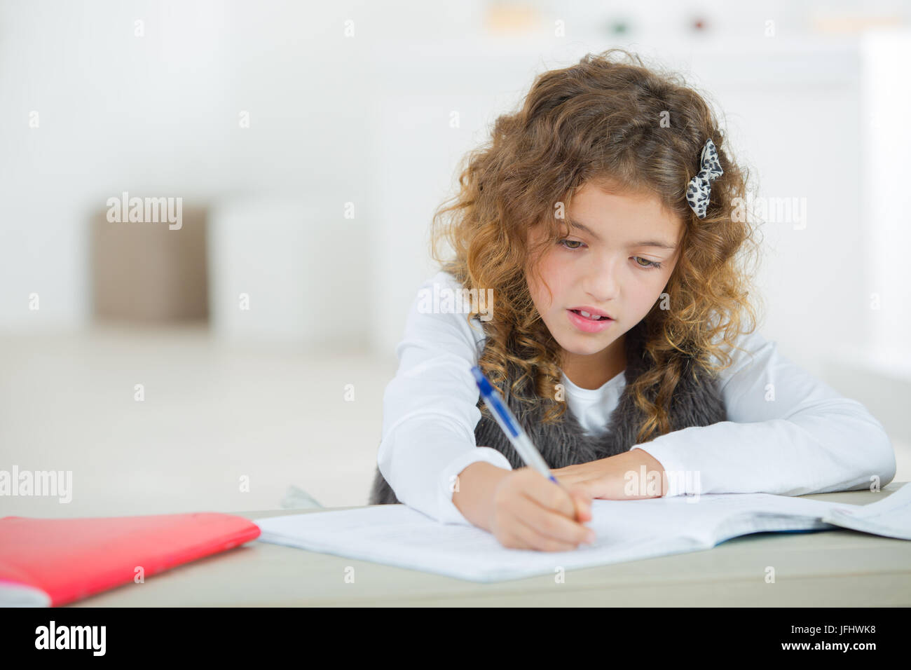 young girl writing Stock Photo - Alamy
