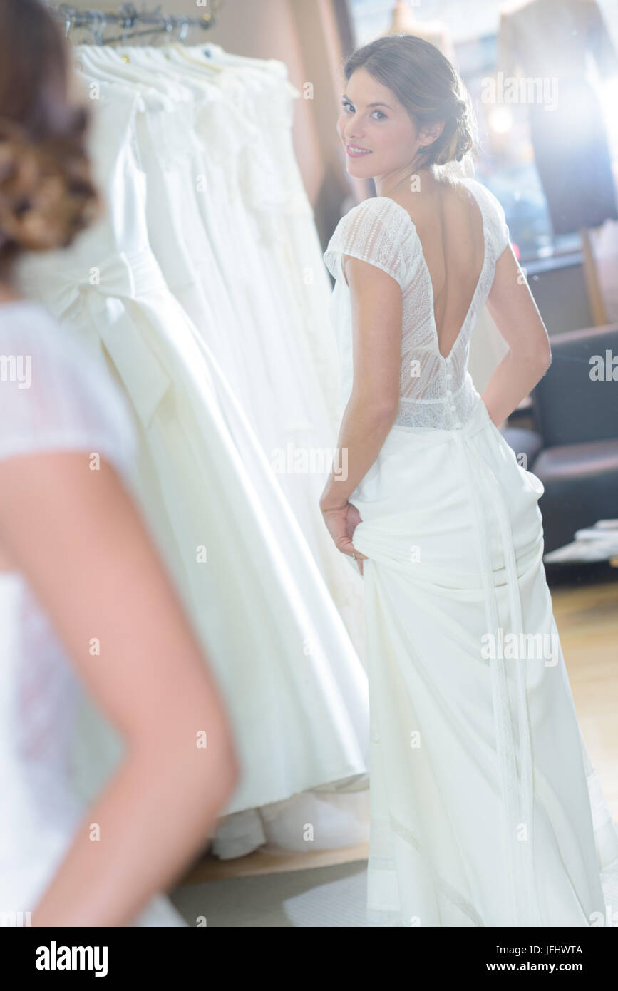 trying the gown Stock Photo - Alamy