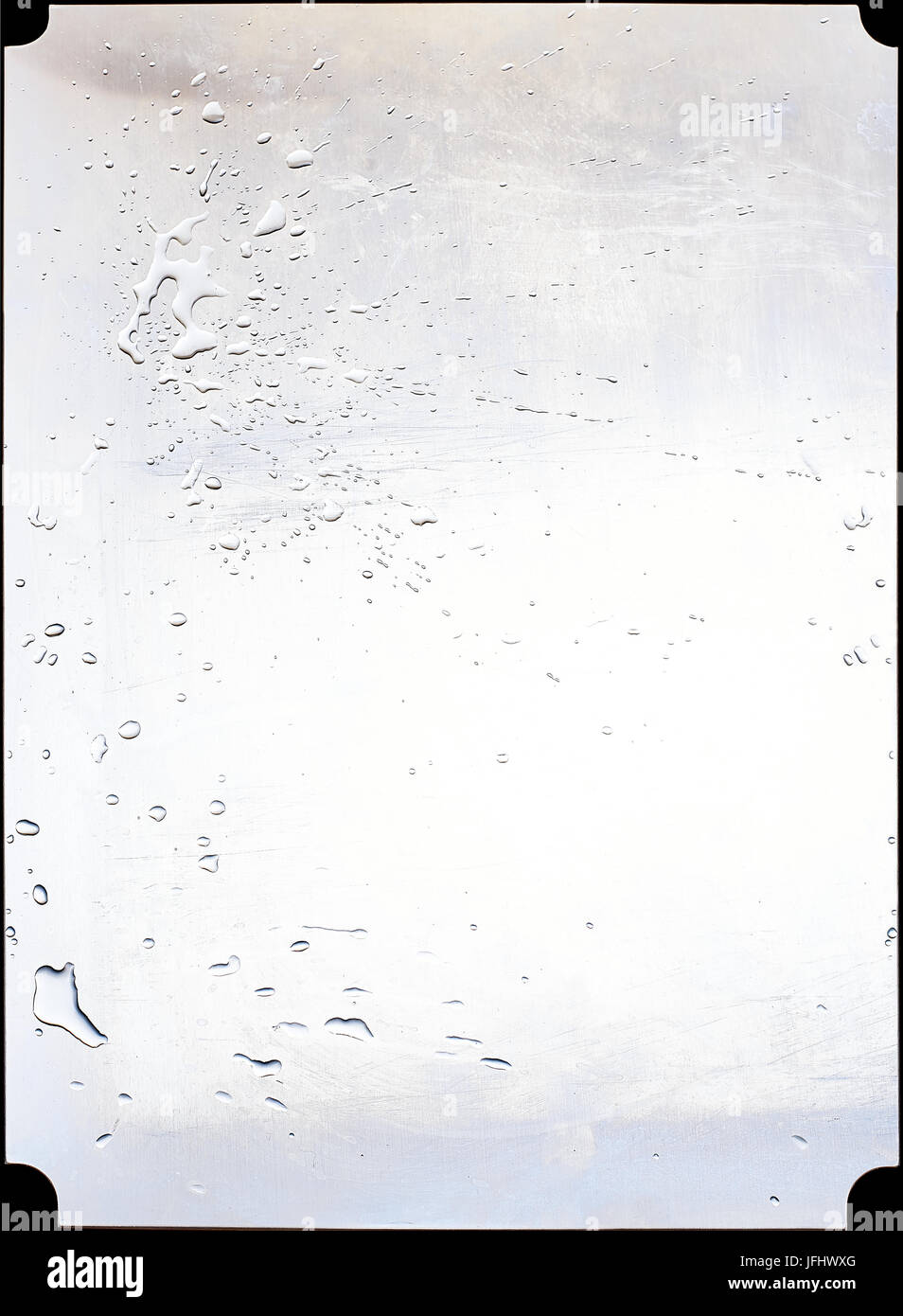 White steel panel of a kitchen splashed with drops of water Stock Photo ...