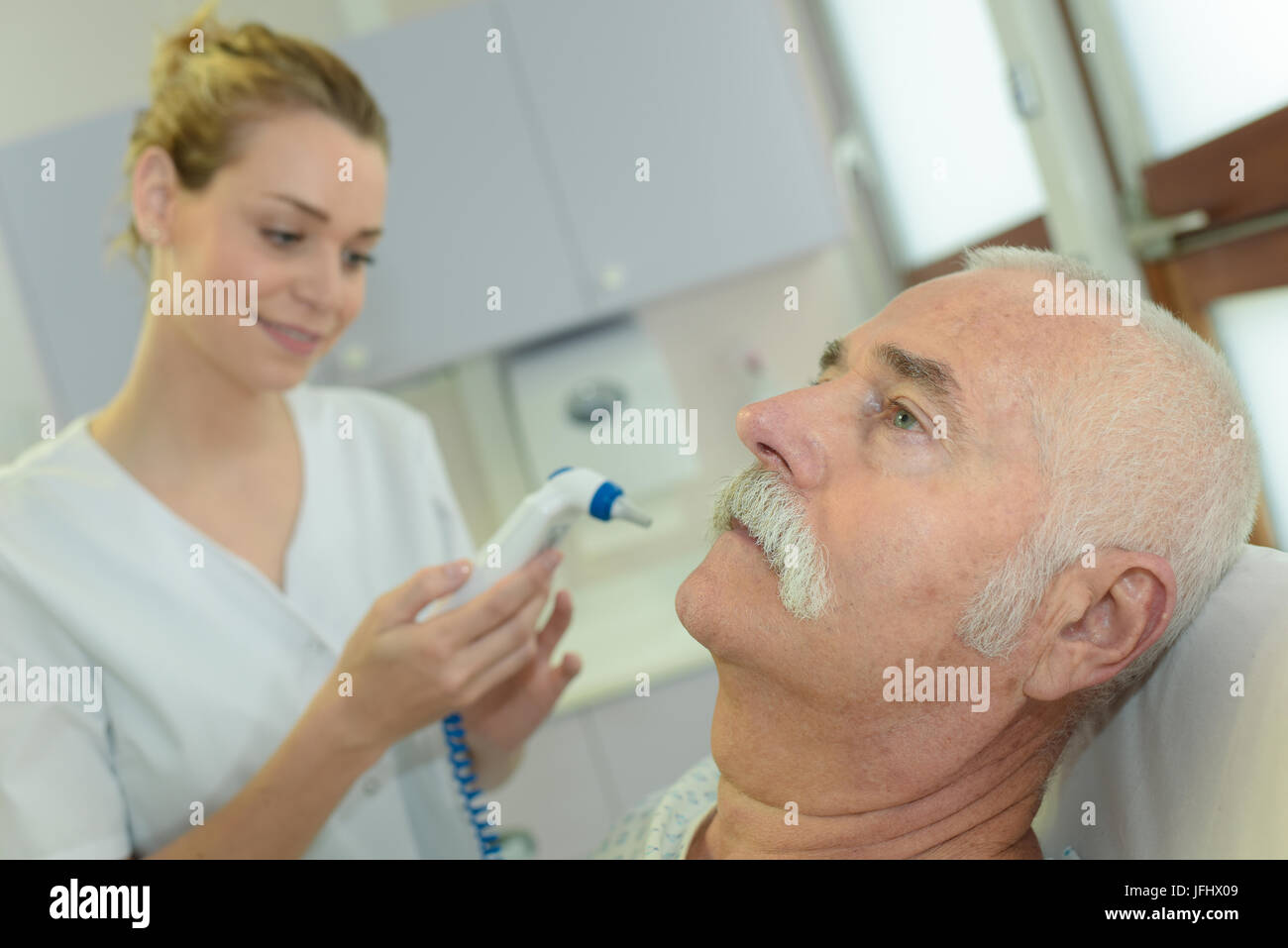 checking the body temperature Stock Photo - Alamy
