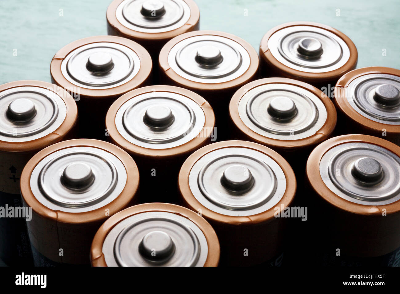 Batteries on Textured Background Stock Photo - Alamy
