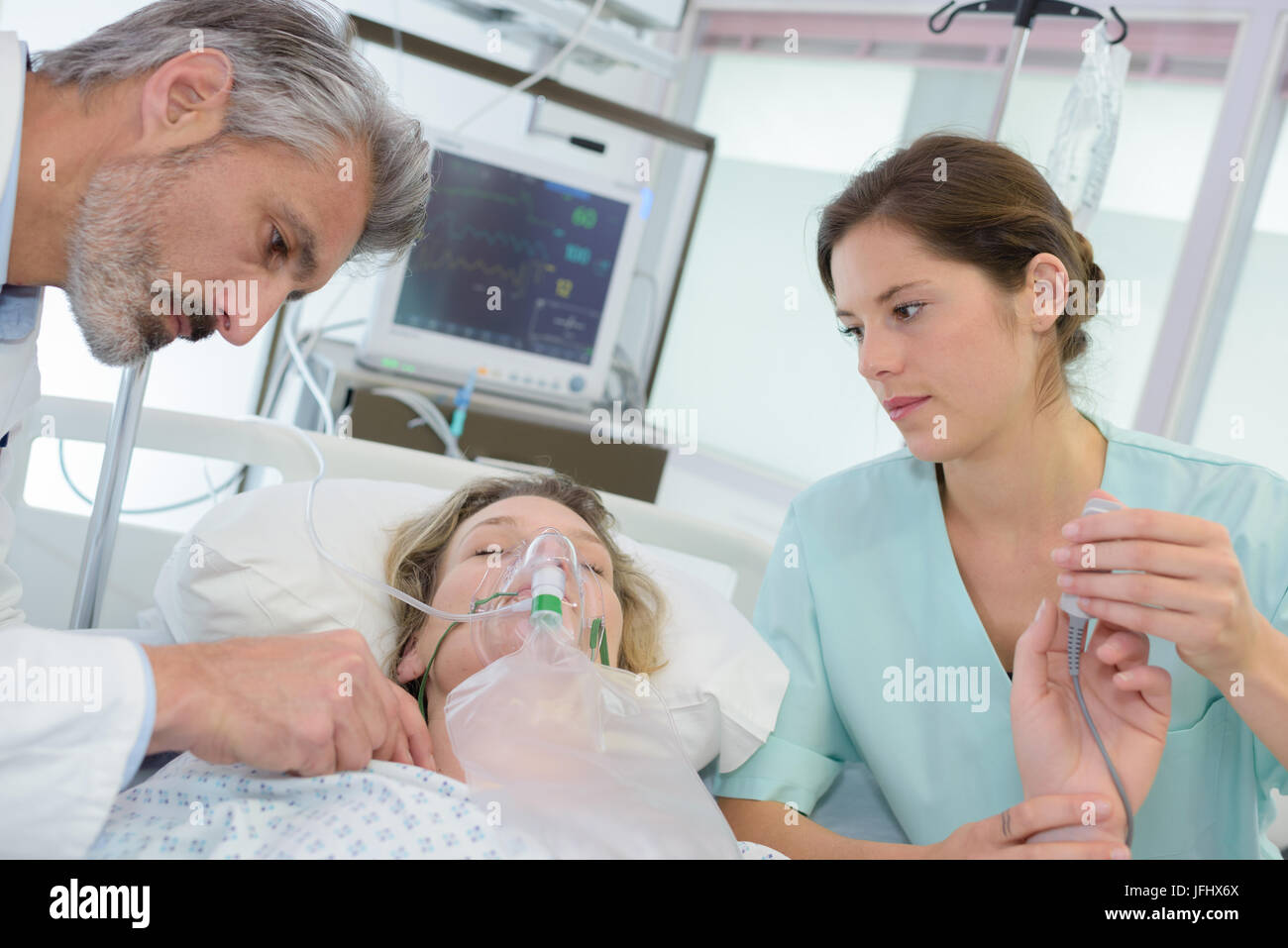 inspecting the patient's condition Stock Photo - Alamy