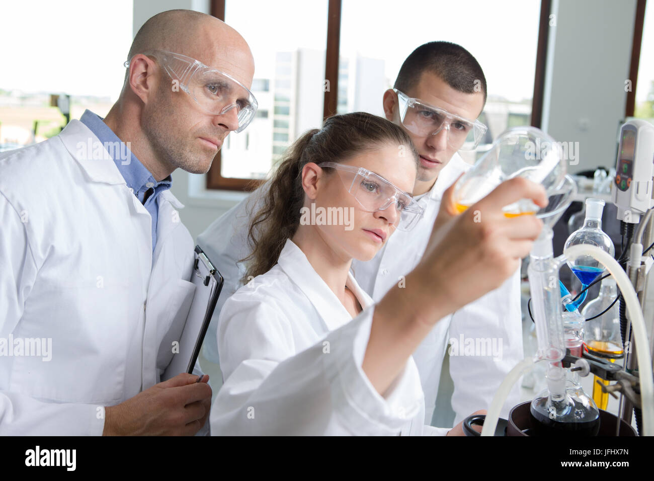 observing the liquid Stock Photo - Alamy