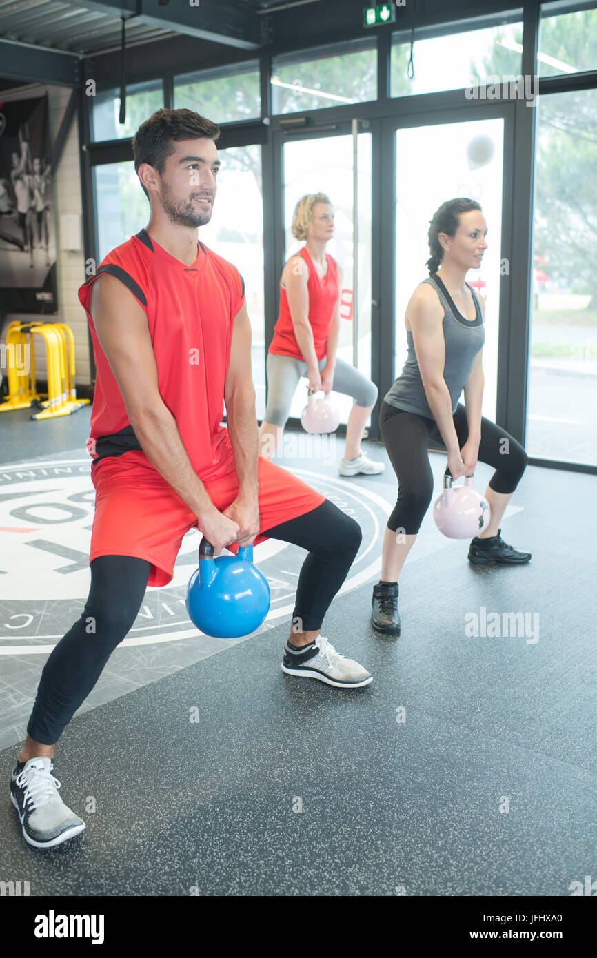 group session in the gym Stock Photo - Alamy