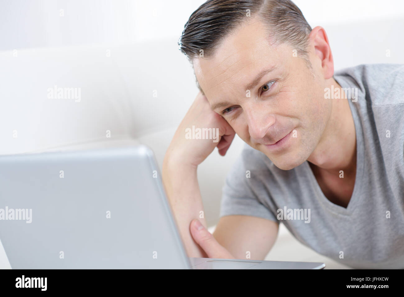 man on laptop Stock Photo - Alamy