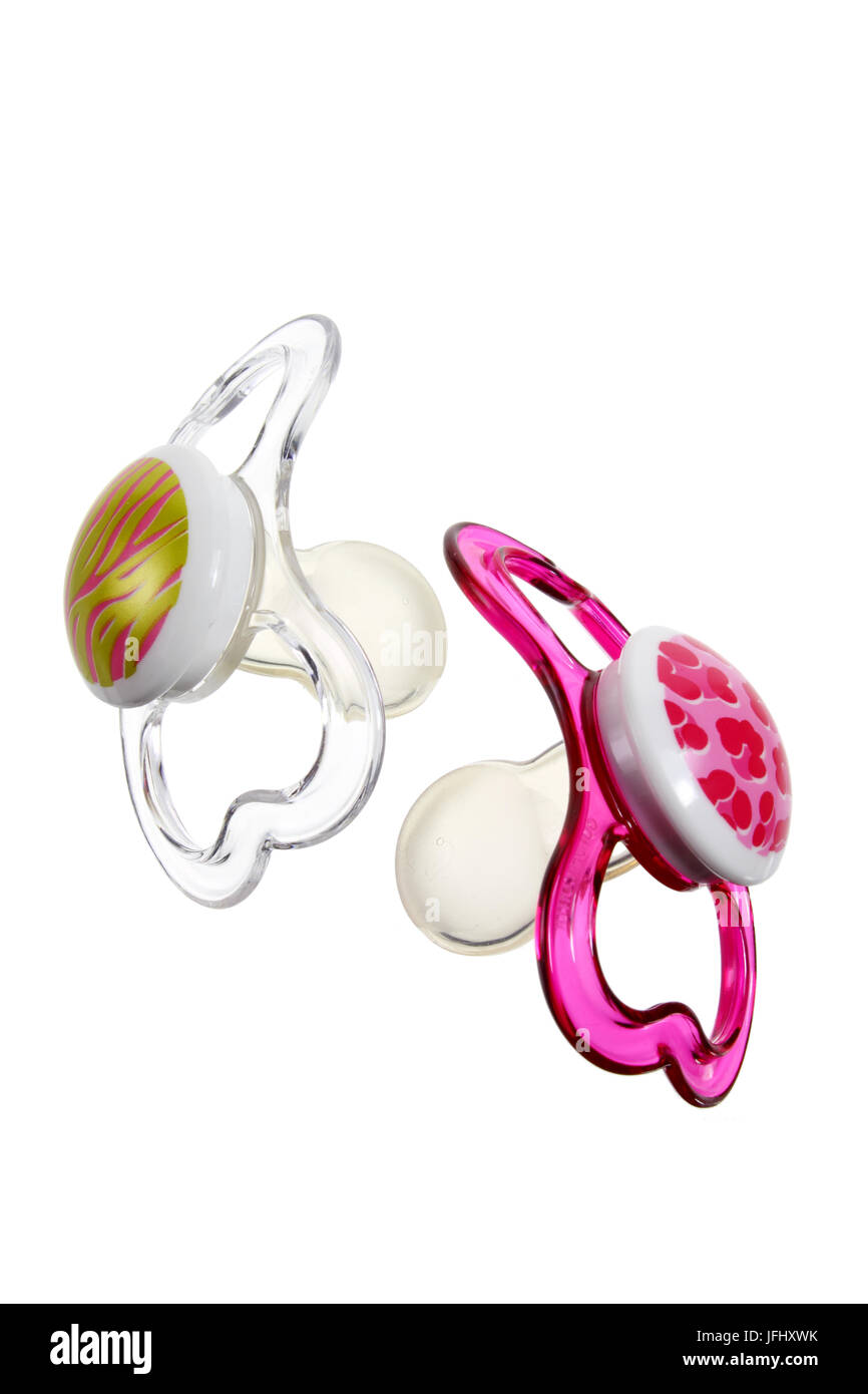 Pacifiers on White Background Stock Photo - Alamy