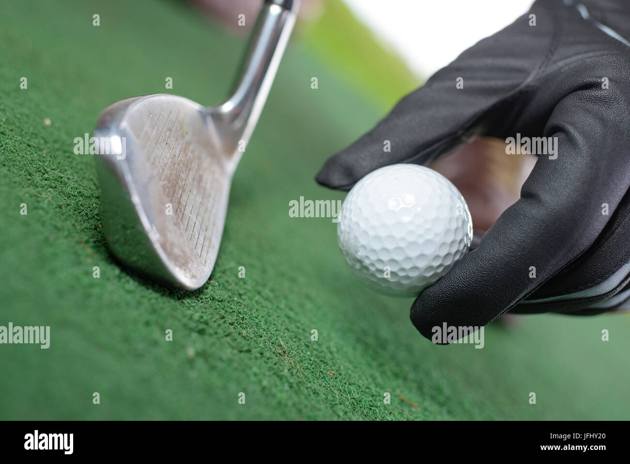 placing the golf ball Stock Photo - Alamy