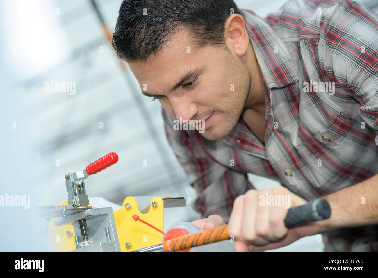 making a design on the rod Stock Photo - Alamy
