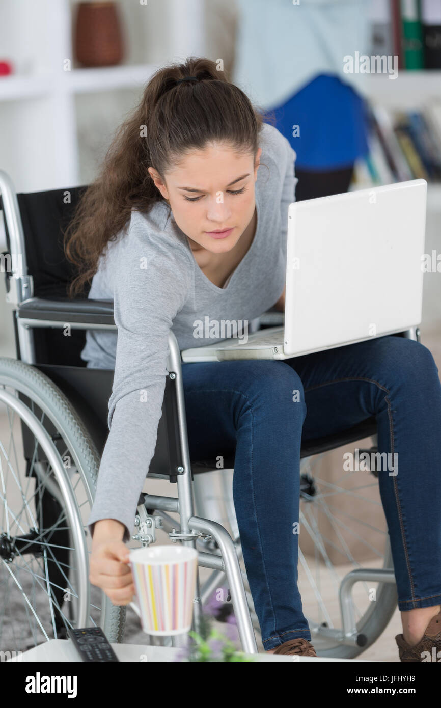 reaching for the cup Stock Photo - Alamy