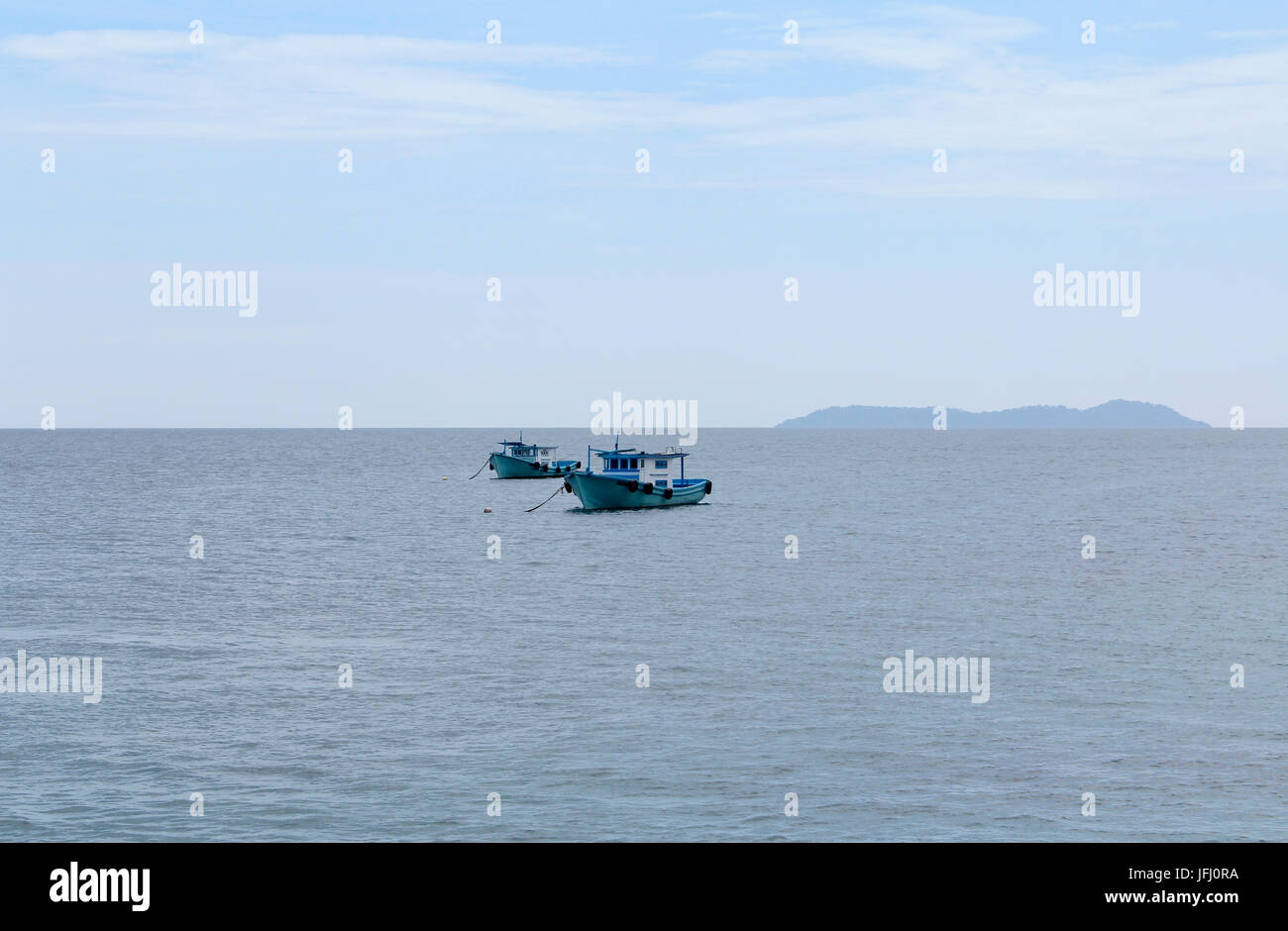 Boats floating in the sea, Tioman Island Stock Photo - Alamy