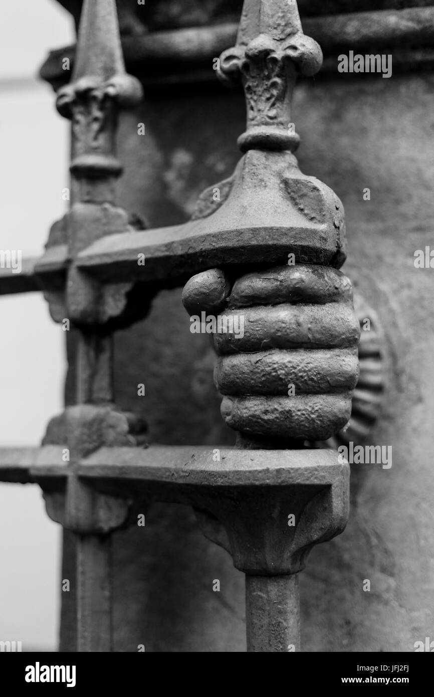 Hand as a hinge in an old gate Stock Photo - Alamy