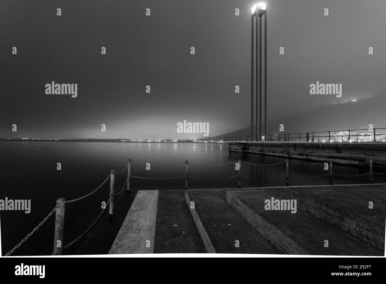 Port entrance, lighthouse, steps Stock Photo - Alamy