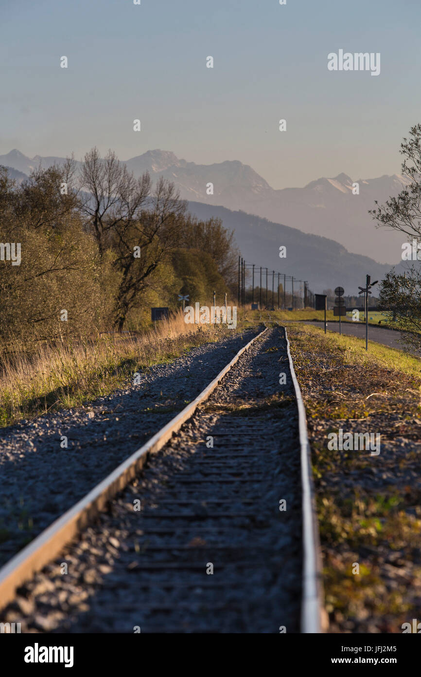 Railroad tracks on embankment Stock Photo - Alamy