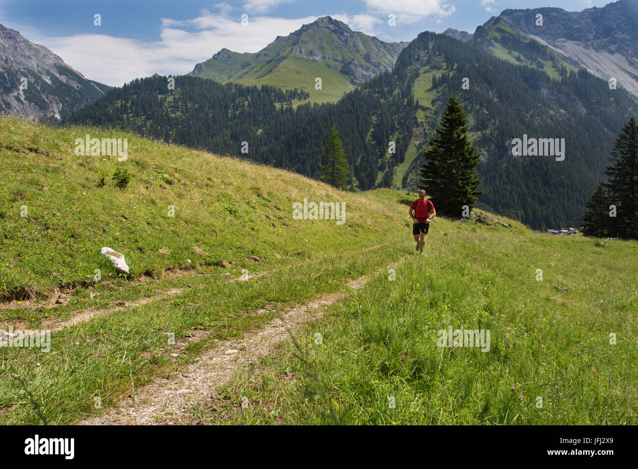 Mountains, person, runner, way Stock Photo - Alamy