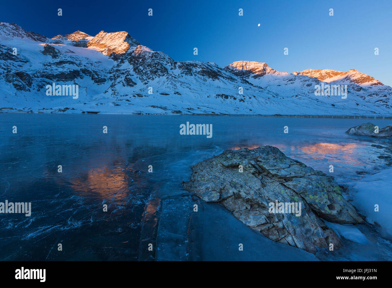 Sunrise at the Lago Bianco at the Berninapass, Canton of Grisons Stock ...