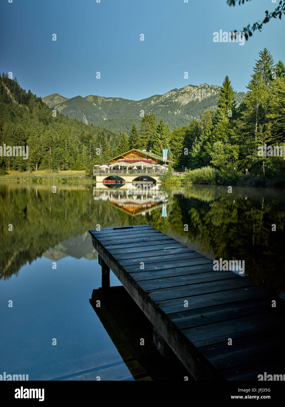 Mountain inn Pflegersee Stock Photo - Alamy