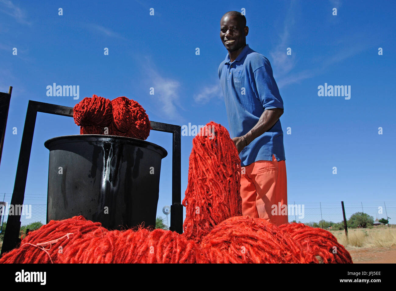 Damara man while the coloration of karakul wool hi-res stock ...